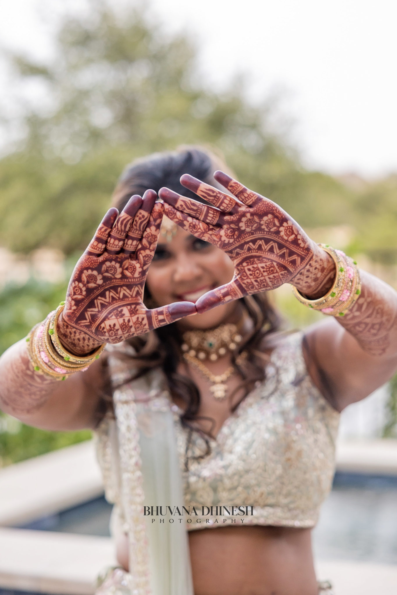 Henna Posing Ideas by Top Indian Wedding Photographer